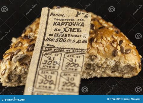 Card On Bread Of 1947 Against The Background Of A Piece Of Bread