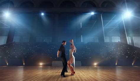 Premium Photo Couple Dancers Perform Latin Dance On Large