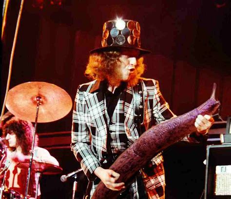 here are a bunch of guitarists playing giant slugs instead of guitars