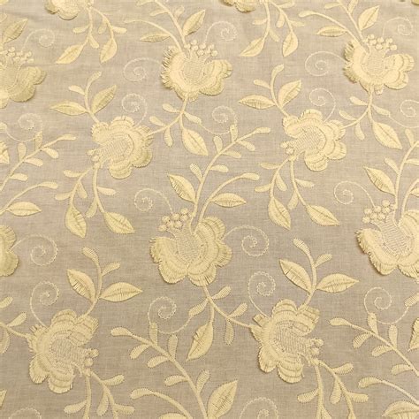 Tessuto Mussola Di Cotone Ricamato Motivo Floreale Beige Giallino Iaia Tessuti