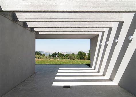 Concrete Home By Osm Is Sunken Into A Hill By An Italian Lake