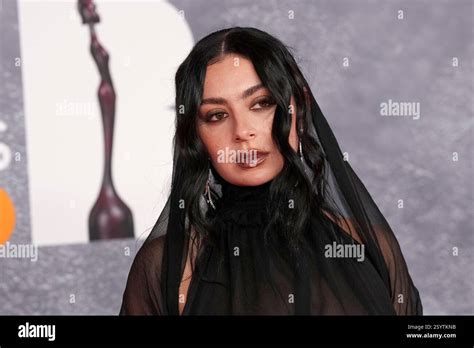 Charli Xcx Poses For Photographers Upon Arrival At The Brit Awards 2025