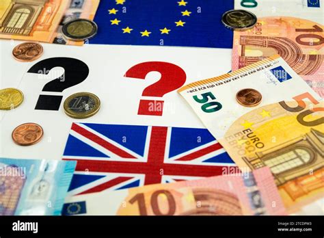 Flags Of Eu And Great Britain With Question Marks And Euros Brexit