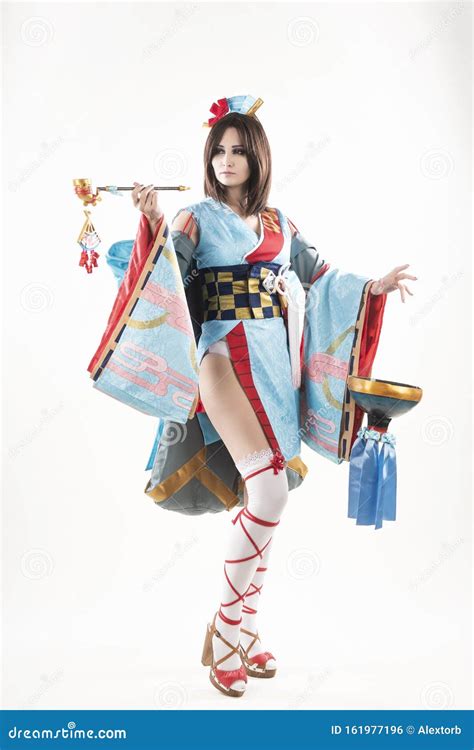 Beautiful Leggy Busty Cosplayer Girl Wearing A Stylized Japanese Kimono