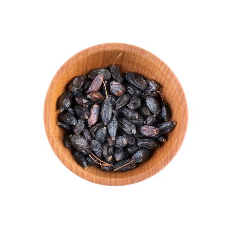 Dried Barberry In Small Wooden Bowl Isolated On White Premium Photo