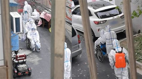 上海2位老人确诊 转运路上互相搀扶 拍摄者：希望两人一起平安回来手机新浪网