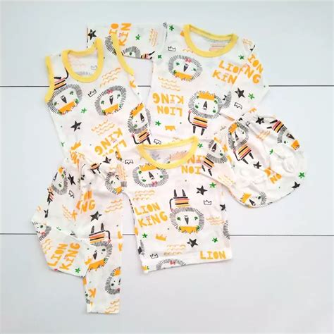 خرید و قیمت لباس پنج تکه نوزادی 0 تا 6 ماهگی لباس سیسمونی نوزادی طرح شیر 5 تکه نوزادی ست لباس 5
