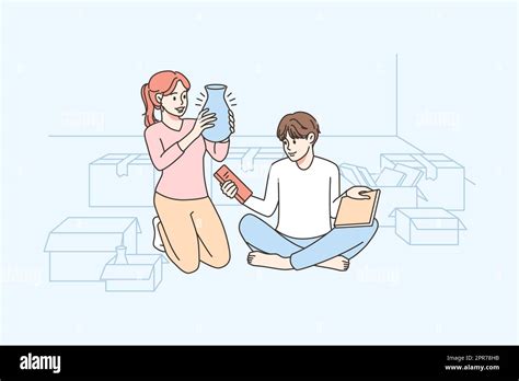 Happy Couple Unpacking Boxes Moving In Together Smiling Man And Woman Open Parcels Sitting On