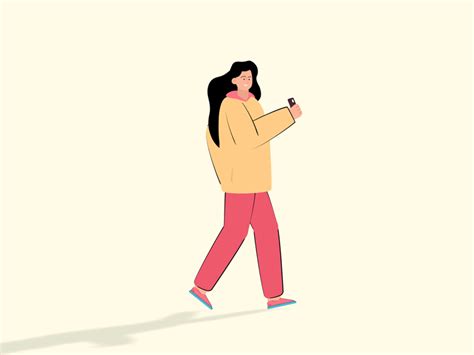 A Woman Walking While Looking At Her Cell Phone
