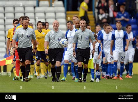 Referee Simon Hooper Walks Out At St Andrews With Assistant Referee Nigel Smith Left And