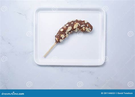 Top Down Frozen Chocolate Banana Almond Slice Toppings Stock Image
