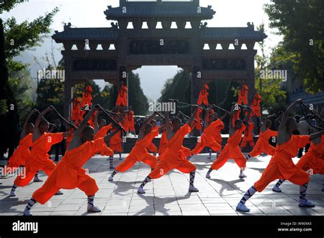 Shaolin monks perform at a welcome ceremony of the 9th Zhengzhou International Shaolin Wushu ...