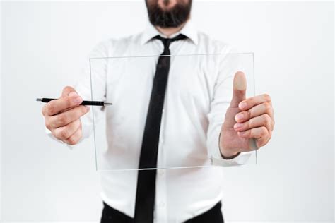 Premium Photo Man Pointing Pen At Glass And Showing New Ideas To