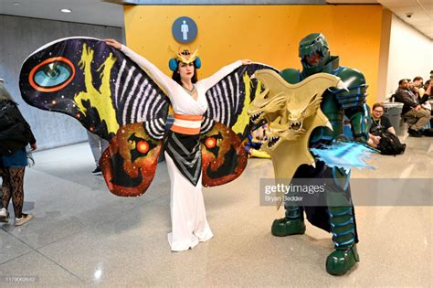 Cosplayers Dressed As Mothra And Godzilla Attend New York Comic Con