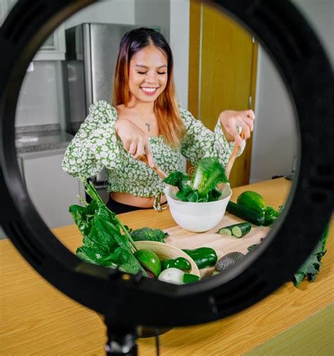 Asian Woman Blogger Or Content Creator Cooking And Recording Video