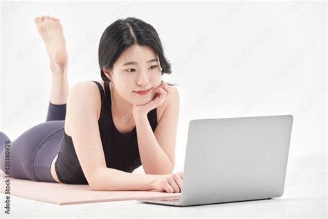 Asia Korean Girl Long Haired Beautiful Pilates Or Yoga Athlete Does A