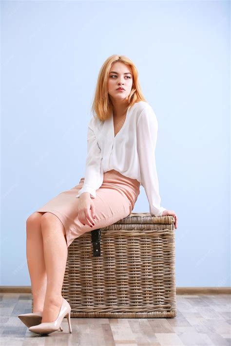 Premium Photo Beautiful Blonde Young Woman In White Shirt And Pink