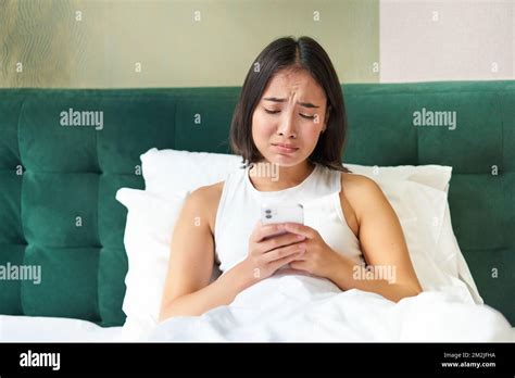 Disappointed Asian Girl Crying And Whining Feeling Upset Lying In