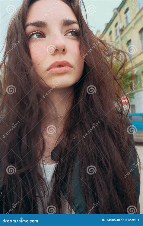 Depressed Girl Looking Up While Posing In Windy Day Stock Image Image