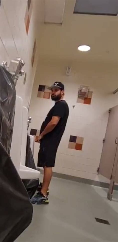 Delivery Driver Shows Off Huge Dick In Stalls At Work