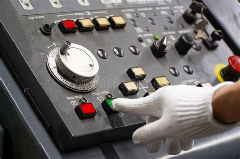 Machine Operator Presses The Green Start Button On The Cnc Machine S