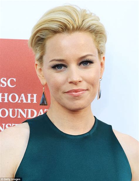 Elizabeth Banks Looks Striking In Satin Dress With Midriff Slashes