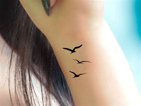 Tattoos Of Birds In Flight