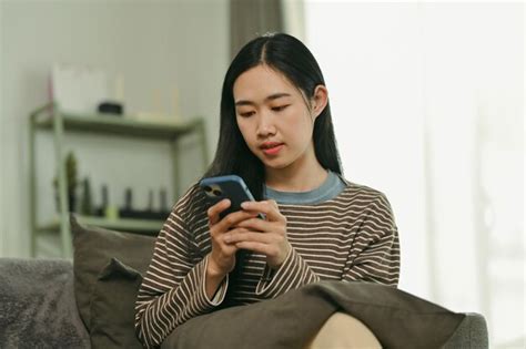 Premium Photo Beautiful Young Woman Relaxing On Comfortable Sofa