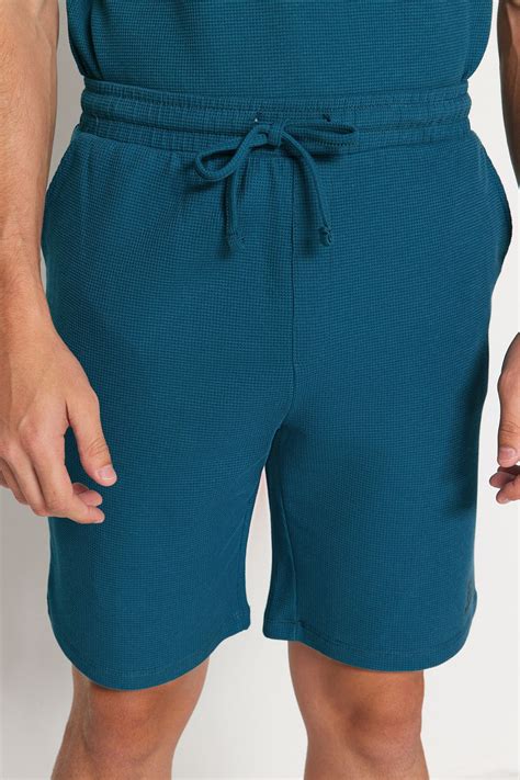 TRENDYOL MAN Petrol Regular Fit Dokulu Örme Şortlu Pijama Takımı TMNSS PT Fiyatı