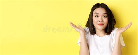 Silly Mistake Close Up Of Cute Asian Girl Saying Sorry Shrugging