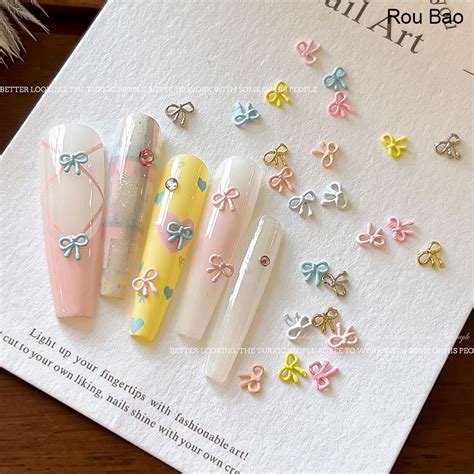 Rou Bao 20 ชิ้นเล็บ Mini Alloy Bow ครีมที่มีสีสัน Hollow Girly เล็บ Art