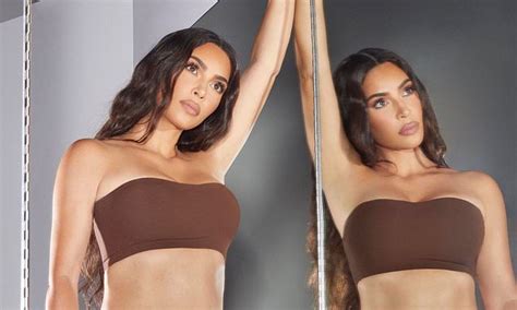 Kim Kardashian Strikes A Sexy Pose As In Front Of A Mirror Wearing Just