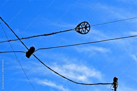 Cable Wood Branch And Electrical Line Abstract A Branch Grew Around Wire When The Tree Was