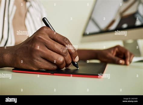 Hand Of Young African American Designer Of Digital Drawing Using