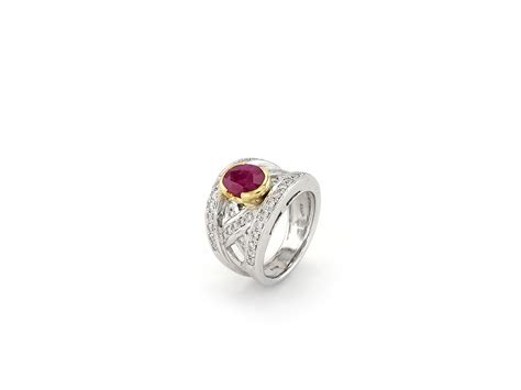 White And Yellow Gold Ring With Ruby And Diamond Jewel In A Box