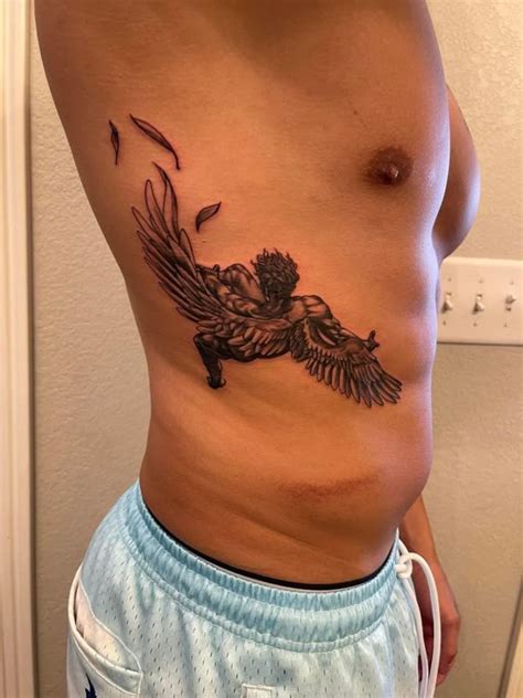 Men Rib Cage Name Tattoos On Ribs