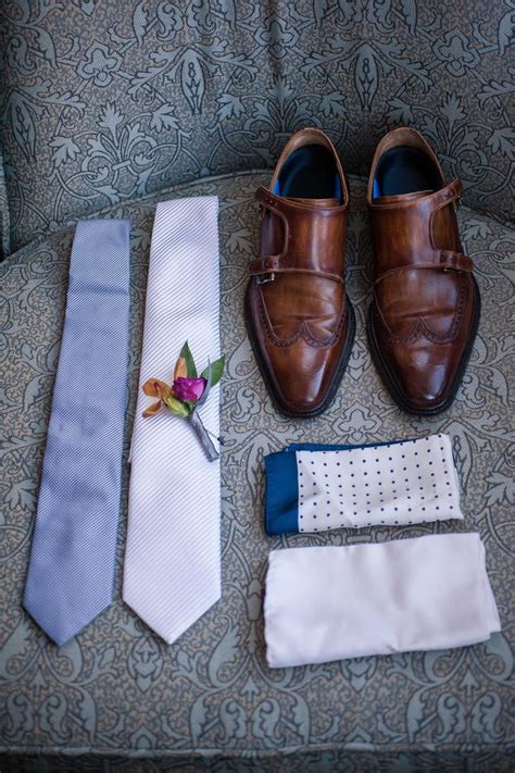 The Groom Pairs His Navy Suit With A Slate Blue Tie And Tawny Brown