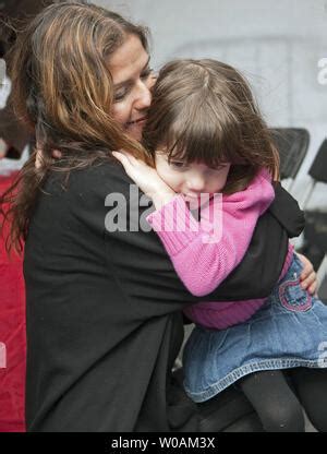Canadian Actorsinger Jill Hennessy L Receives A Hug From Her