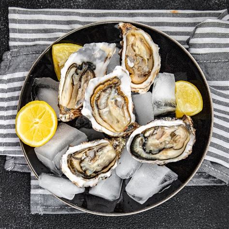 Premium Photo Oyster Seafood Fresh Meal Oysters Food Snack On The Table