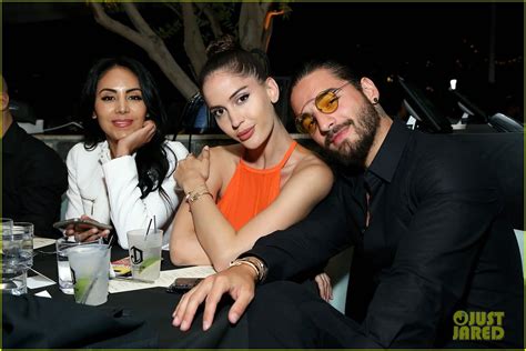 Maluma Celebrates Haute Living Cover With Girlfriend Natalia Barulich