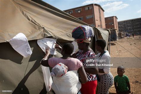 Residents Of Mbare Check Polling Station Results Posted Outside A