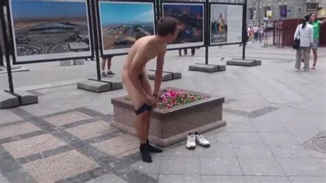 Young Exhibitionist Walking Naked Around City Centre
