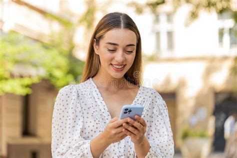 Caucasian Young Woman Using Smartphone Typing Texting Social Media