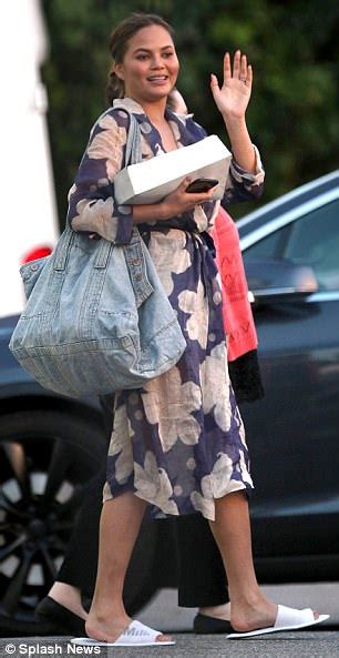 Chrissy Teigen Wears Floral Robe At Shoot In Hollywood Daily Mail Online