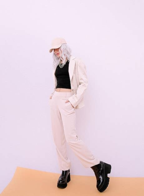 Premium Photo Transgender Woman Fashion Portrait In Stylish Beige