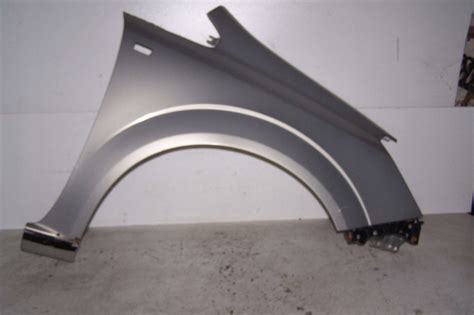 OPEL ZAFIRA B BŁOTNIK PRAWY Z Shrot pl