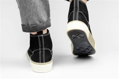 Premium Photo Rear View Of Female Legs In Sneakers Closeup