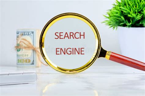 A Magnifying Glass Focuses On The Words Search Engine Symbolizing The