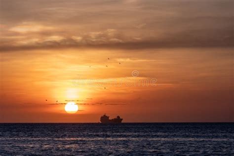 Oil Tanker Ship At Sunset In The Sea Stock Image Image Of Anchored