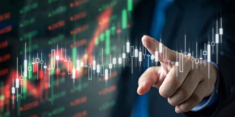 A Man Is Pointing At A Graph Stock Market Stock Image Image Of